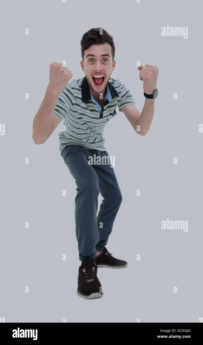 Happy young business man celebrating his success Stock Photo - Alamy