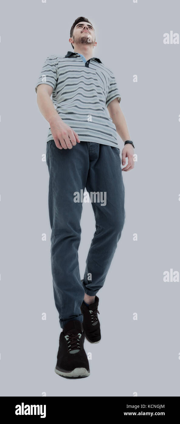 Picture of a smiling business man stepping on something, over white ...