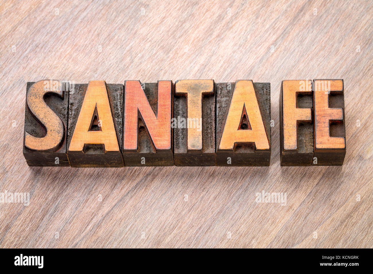 Santa Fe word abstract in vintage letterpress wood type against grained ...