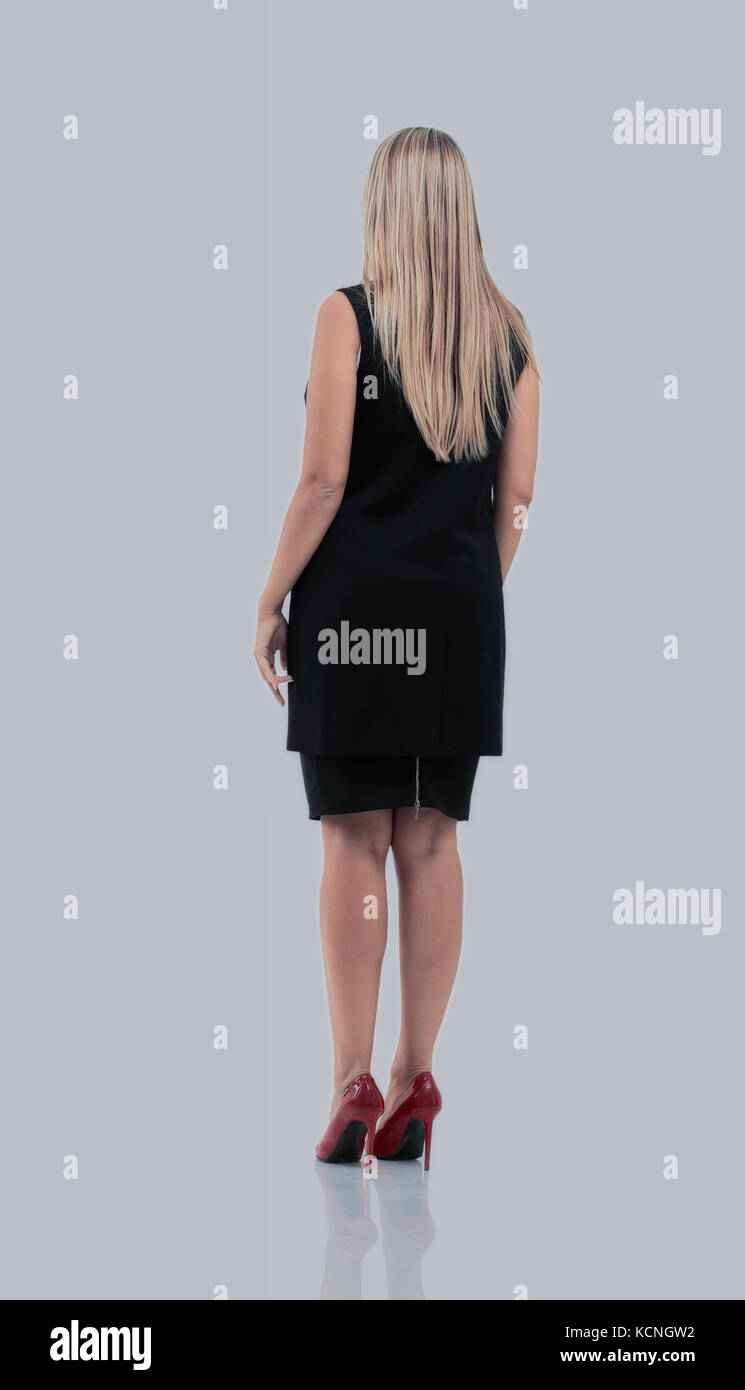 Young businesswoman looking at something. Back view Stock Photo - Alamy