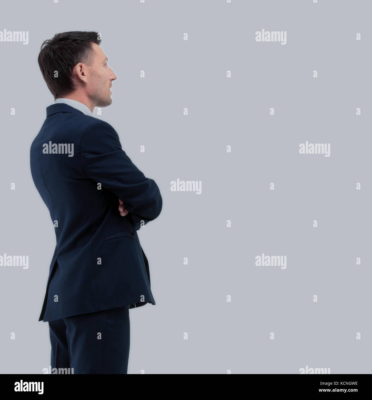 Side view of a smiling businessman, On white background Stock Photo - Alamy