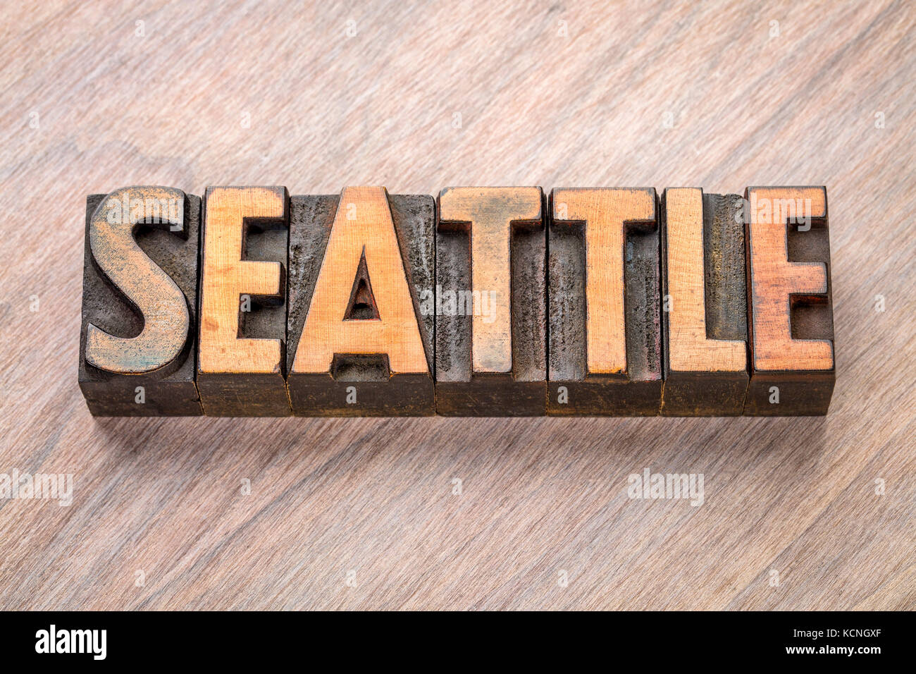 Seattle word abstract in vintage letterpress wood type against grained ...