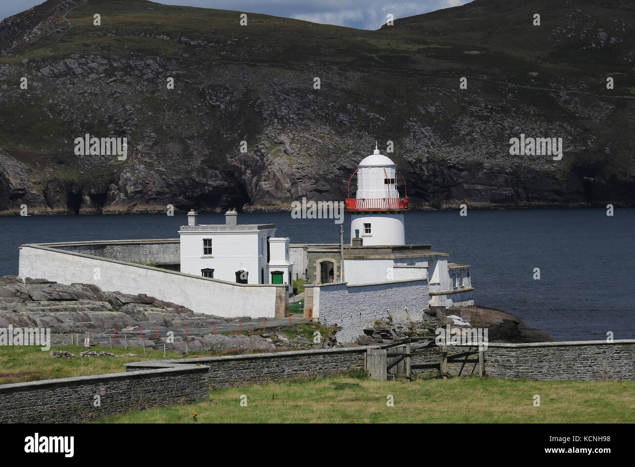 Lighthouse off the coast of Ireland Stock Photo - Alamy