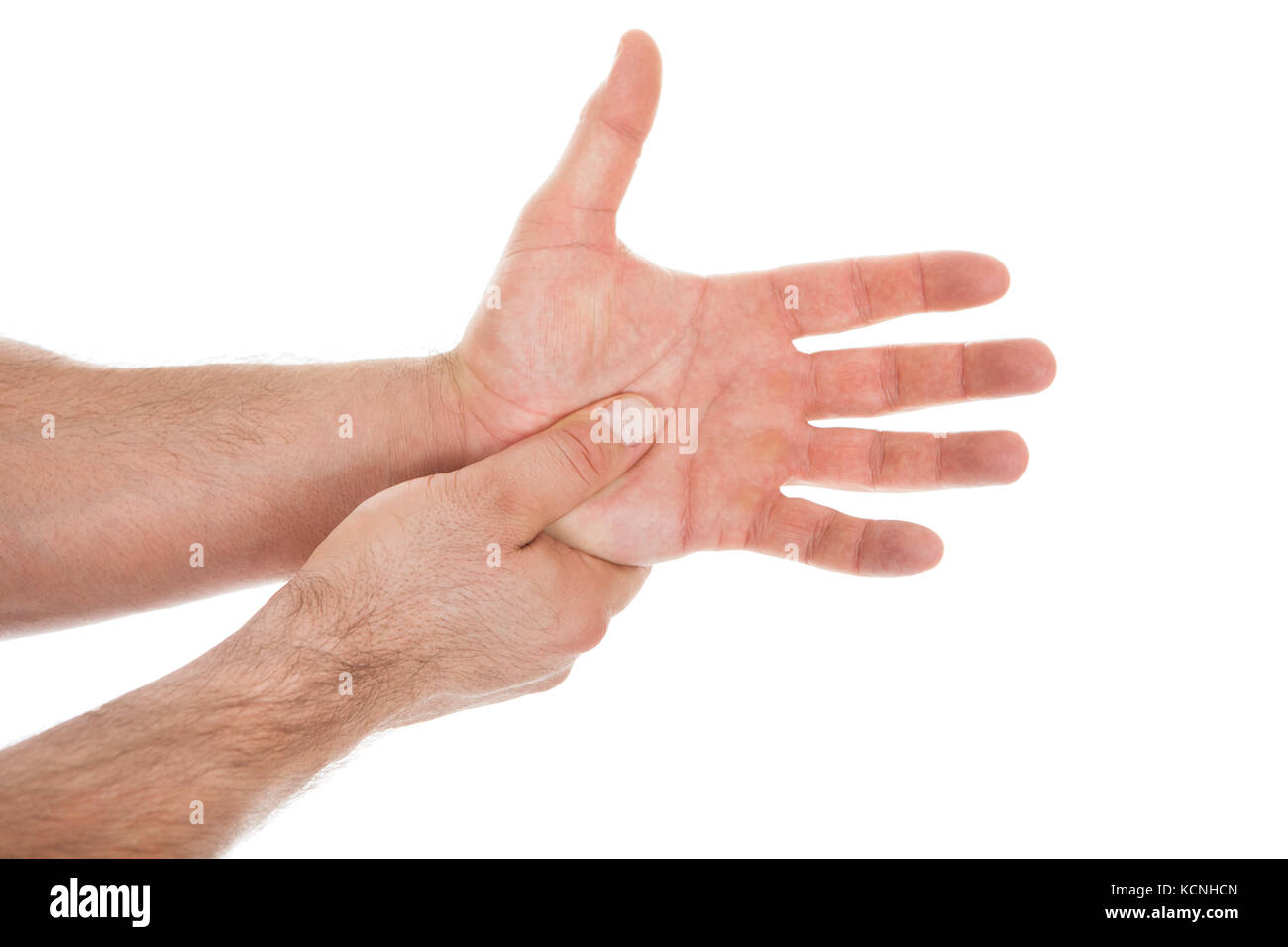 Close-up Of Person Pressing Palm With Thumb On White Background Stock ...
