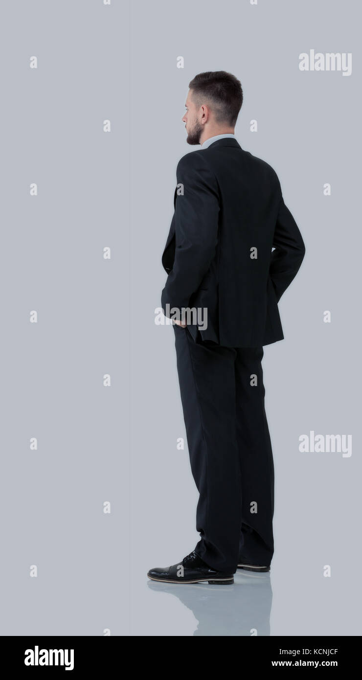 Portrait of the young smiling turned businessman isolated on a white ...