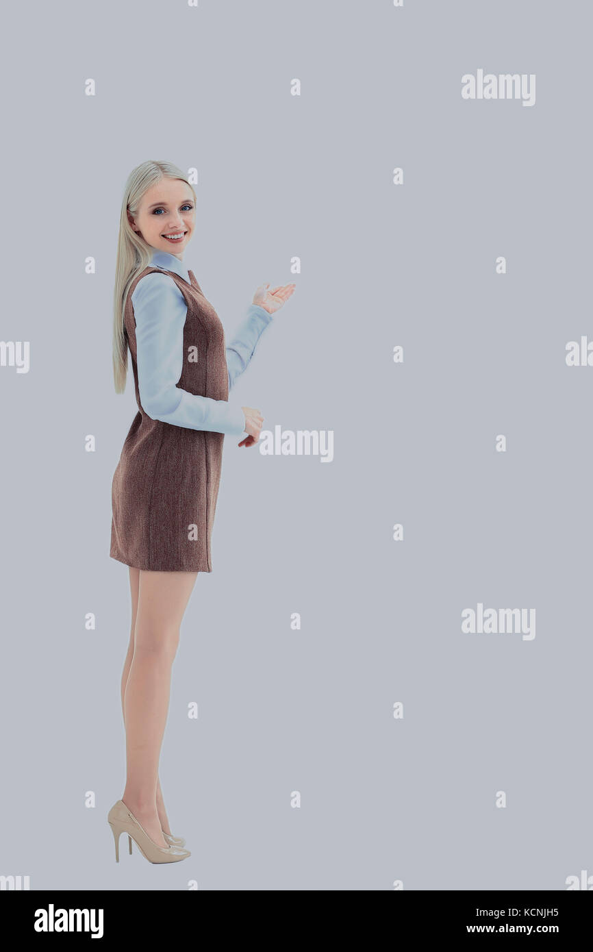 Happy smiling young woman presenting and showing your text or product ...