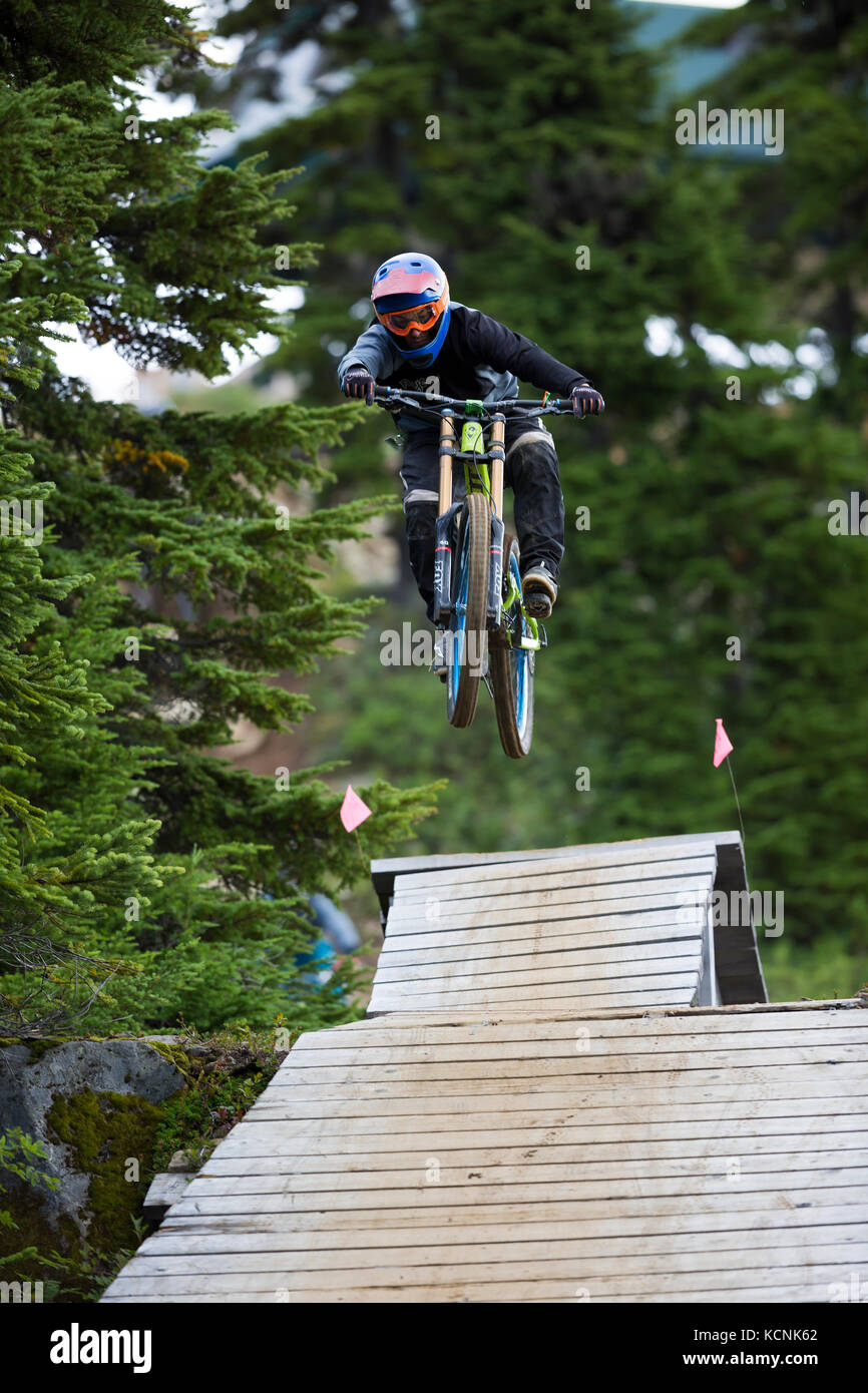 A mountain biker goes for air on one of the Mt. Washington trails. The ...
