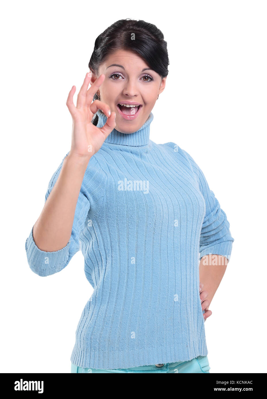 Portrait of a beautiful woman showing the OK sign over white Stock ...