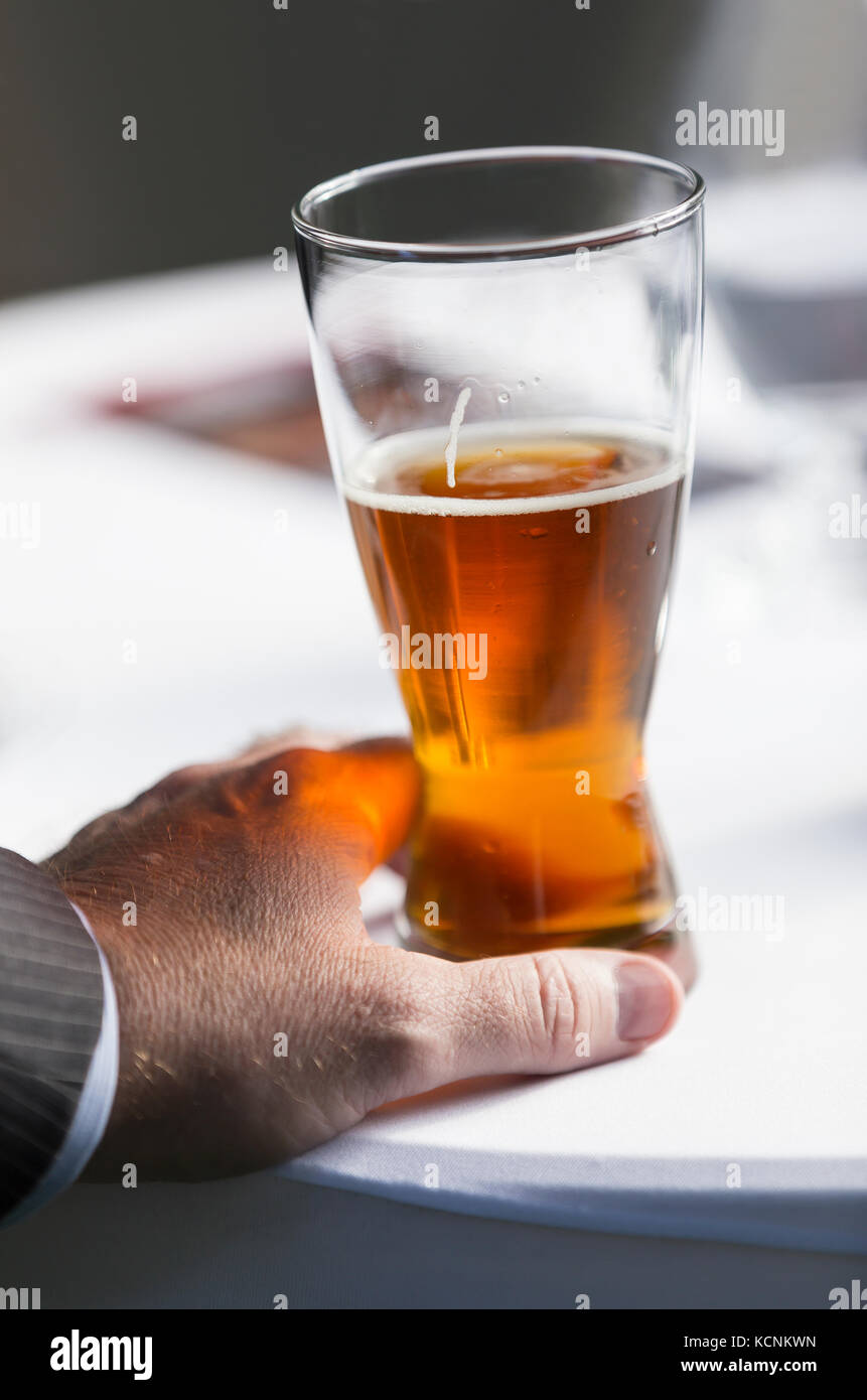 backlit beer showcases it's rich amber color Stock Photo - Alamy