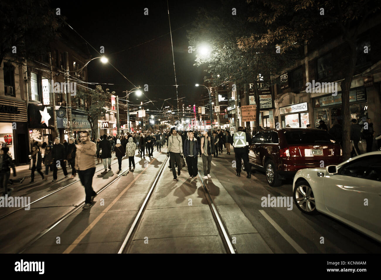 Crowd on Toronto streets during Nuit Blanche festival of contemporary ...