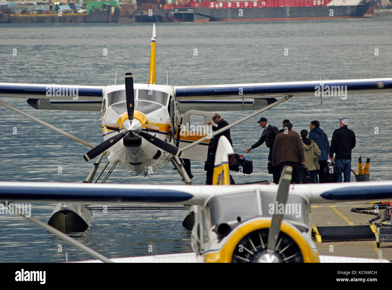 Passengers boarding a hydroplane heading to Victoria in Coal Harbour ...