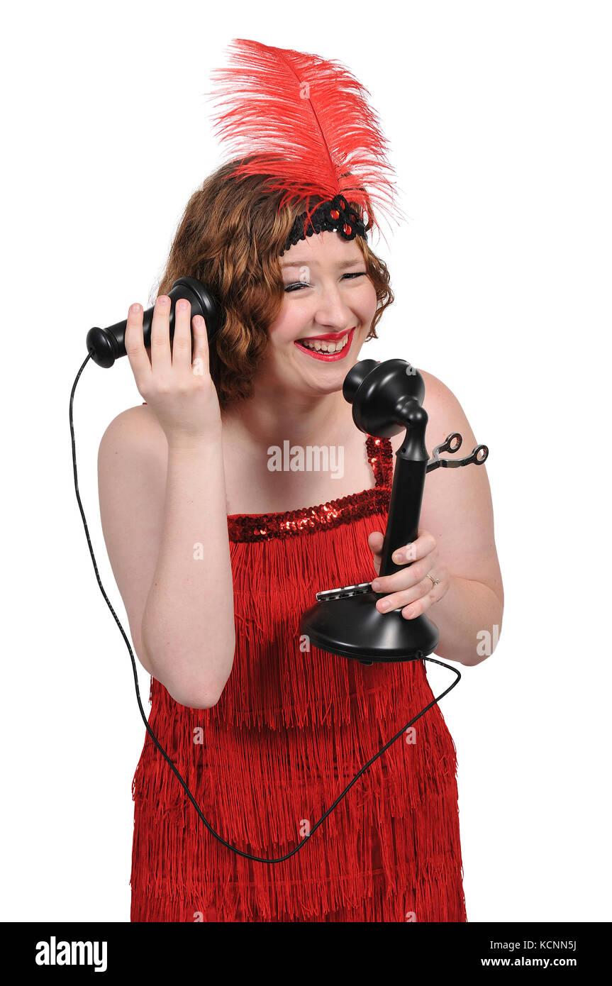 Woman using an old timey vintage candlestick phone Stock Photo - Alamy
