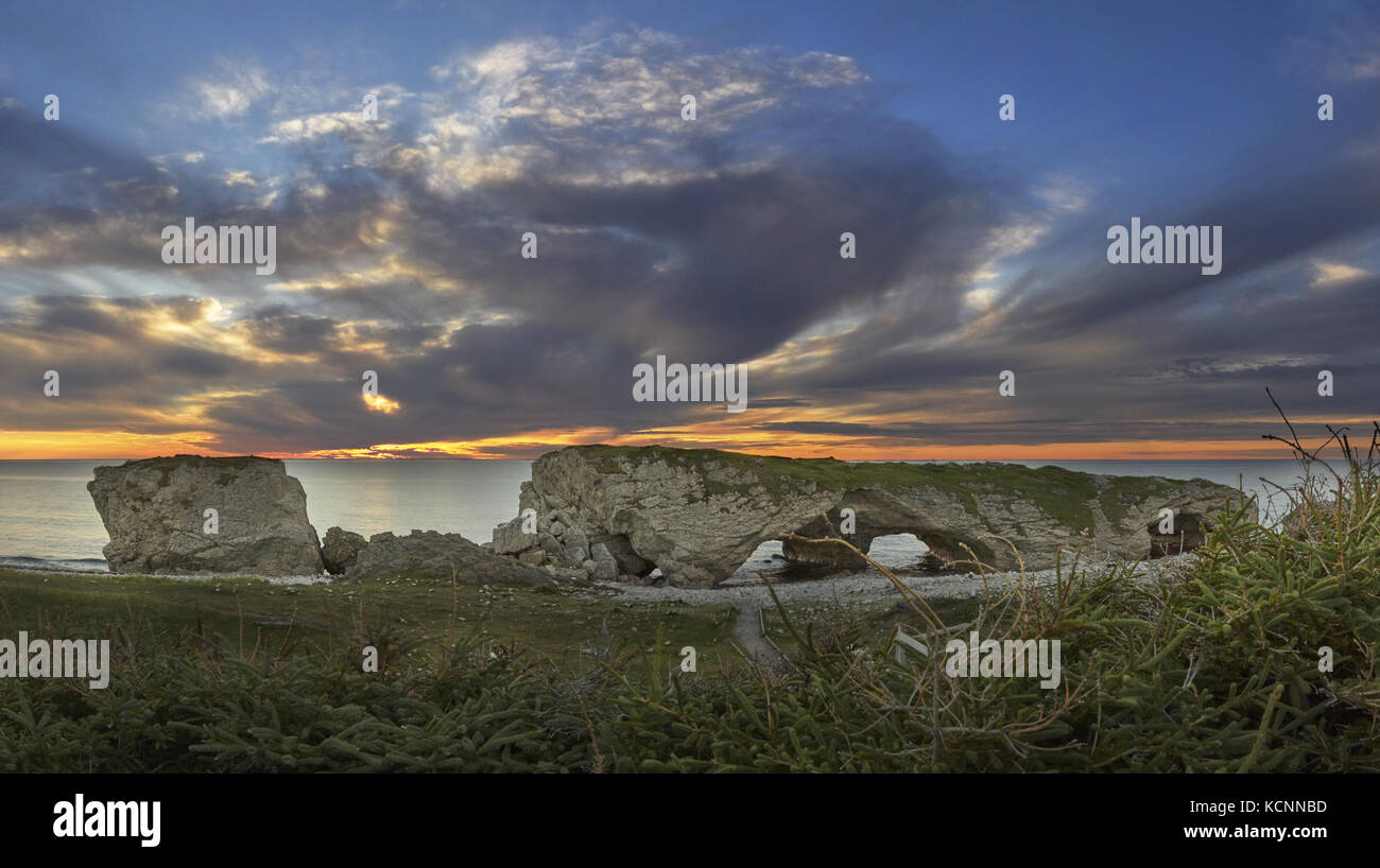 Sunset Through the Arches, Lime Stone rock formation, the Arches ...