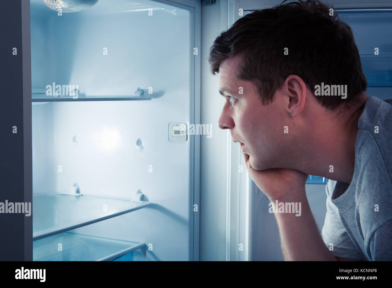 Empty fridge man hi-res stock photography and images - Alamy