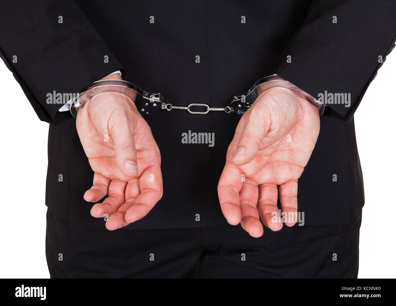 Handcuffs black man hi-res stock photography and images - Alamy