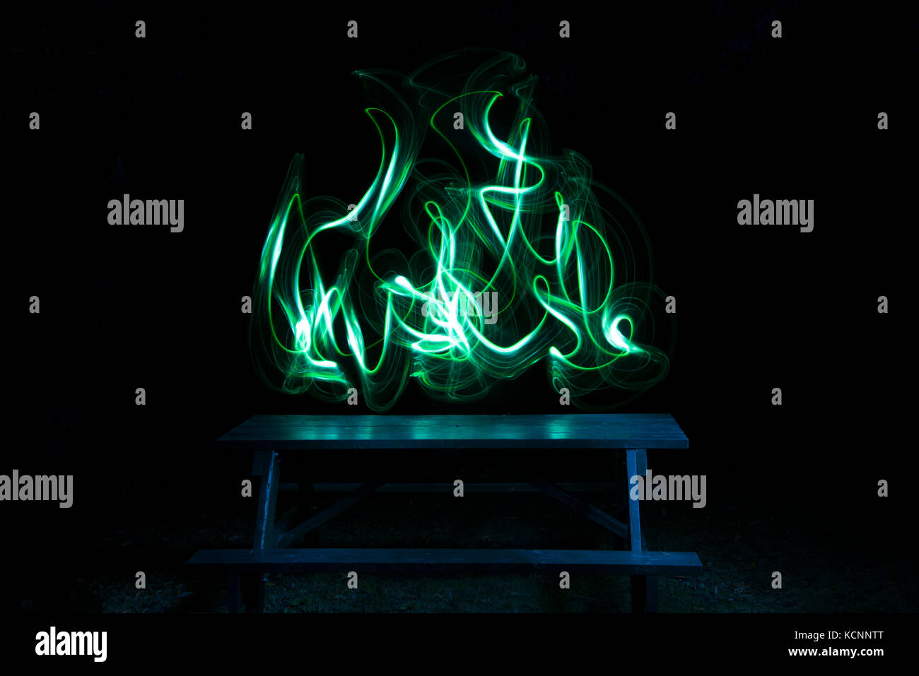 Light painting over a picnic table outside Stock Photo - Alamy