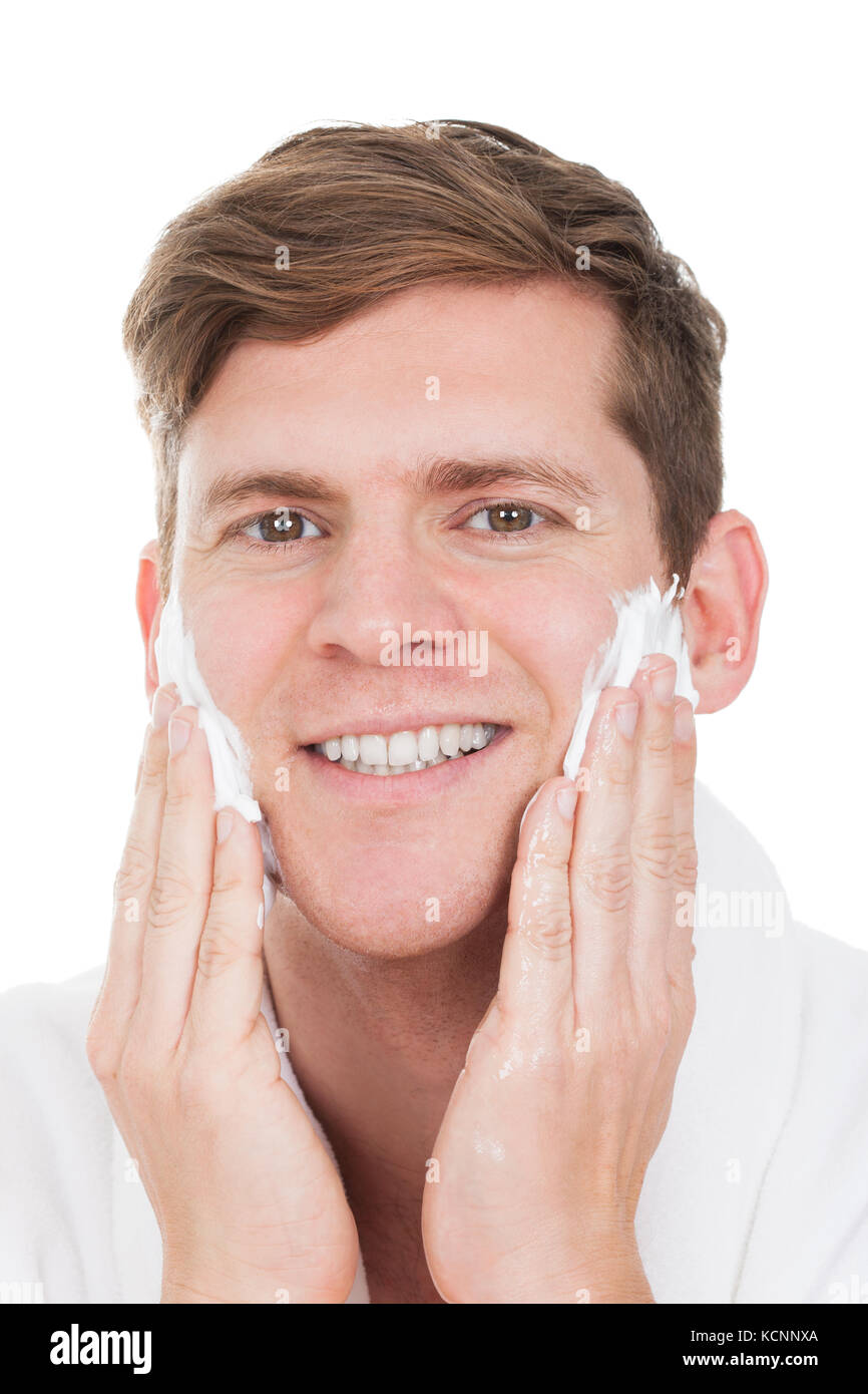 Happy Young Man Applying Shaving Cream Isolated On White Background ...