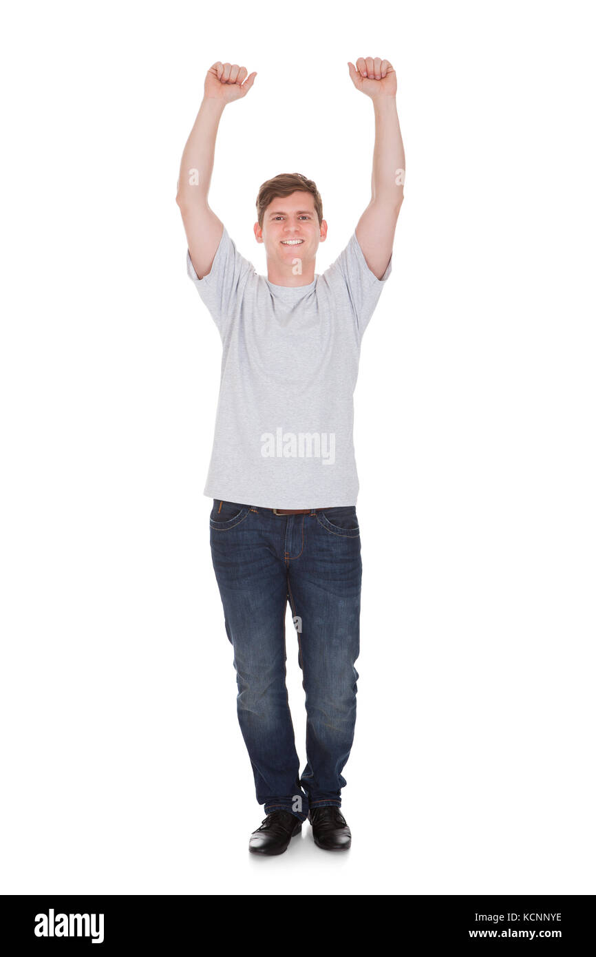 Young Happy Man Standing Over White Background Stock Photo - Alamy