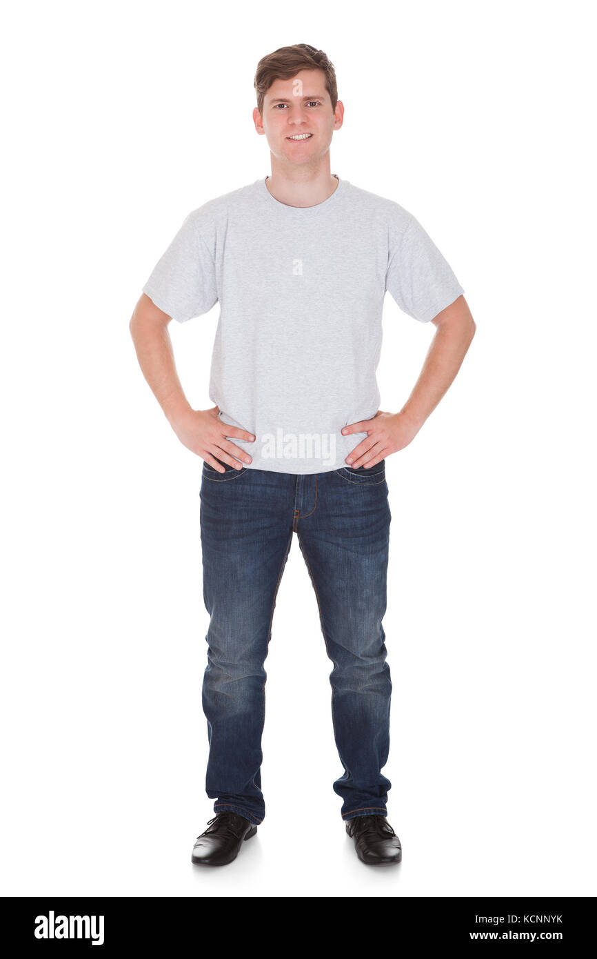 Young Happy Man Standing Over White Background Stock Photo - Alamy