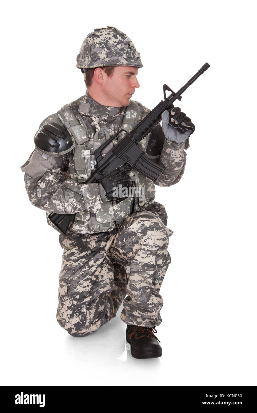 Close-up Of Solider Aiming At Direction Isolated Over White Background ...