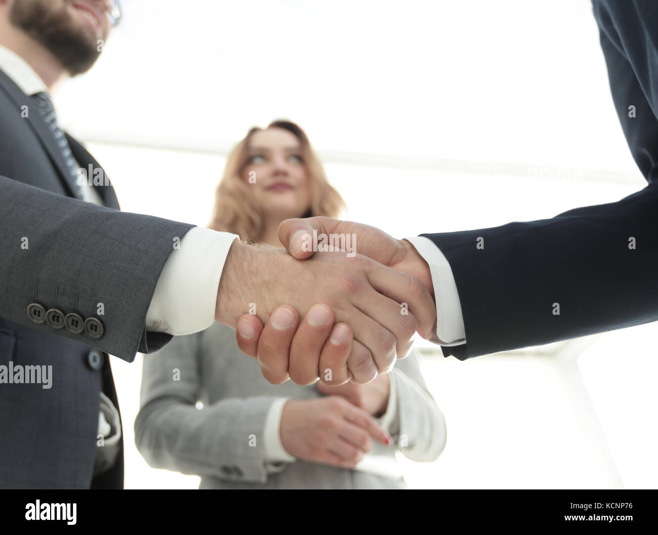 Photo of handshake of two happy businessmen Stock Photo - Alamy