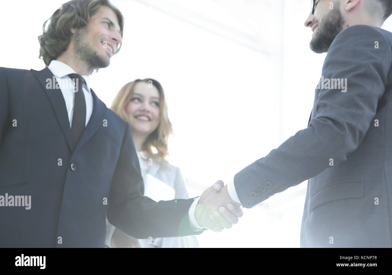 Photo of handshake of two happy businessmen Stock Photo - Alamy