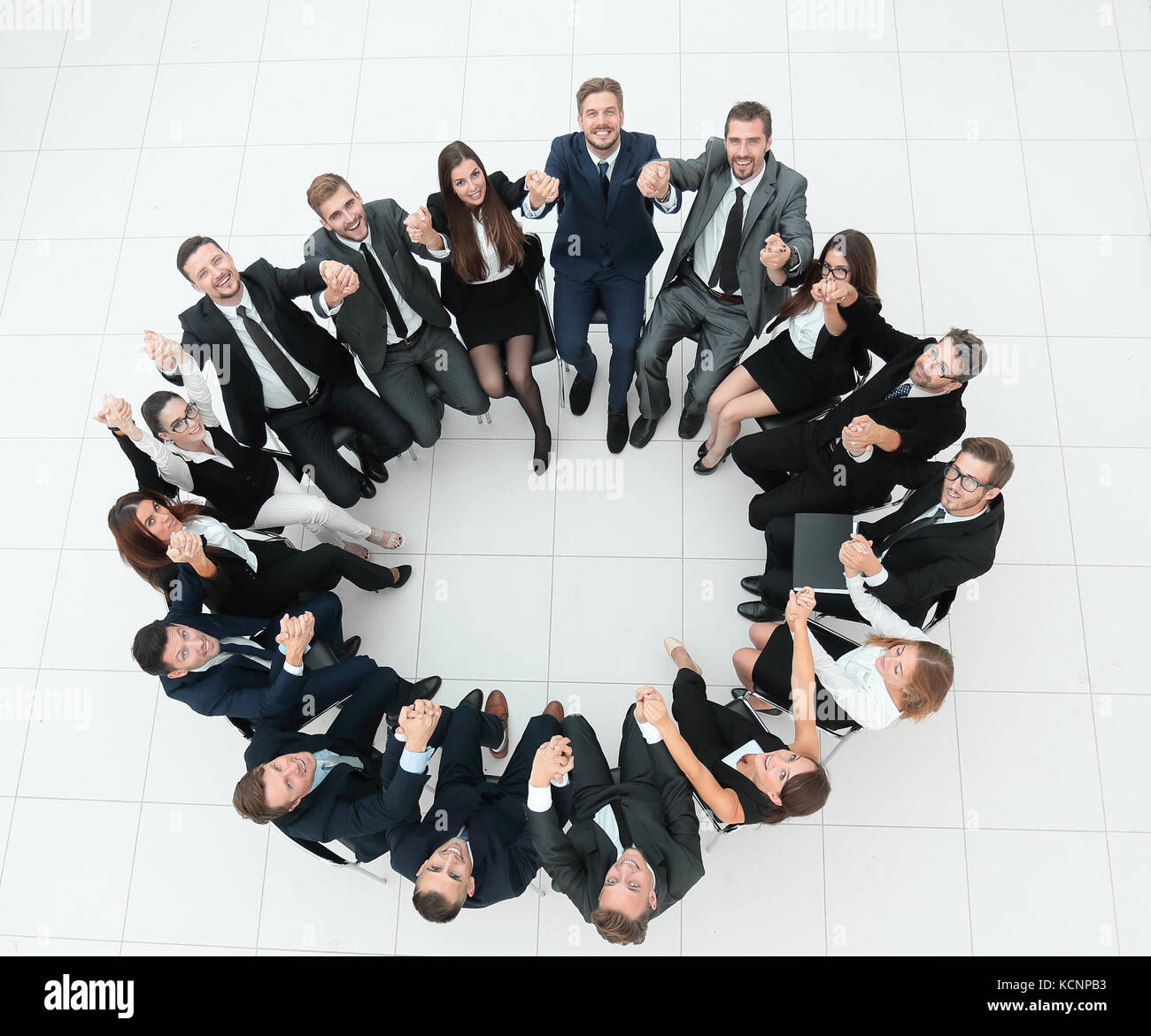 concept of team building .large successful business team sitting in a ...