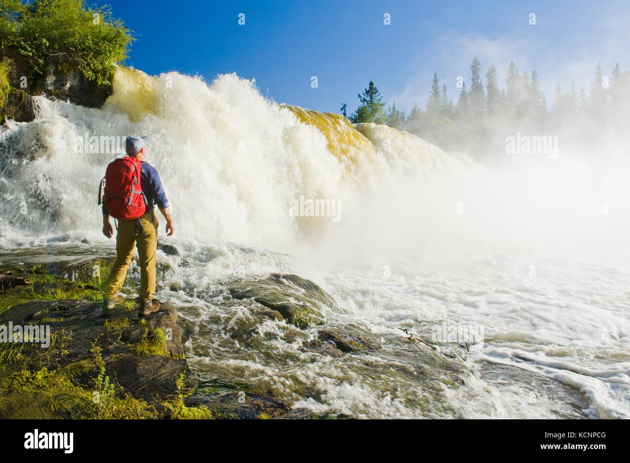 hiker at Pisew Falls, Pisew Falls Povincial Park along the Grass River ...