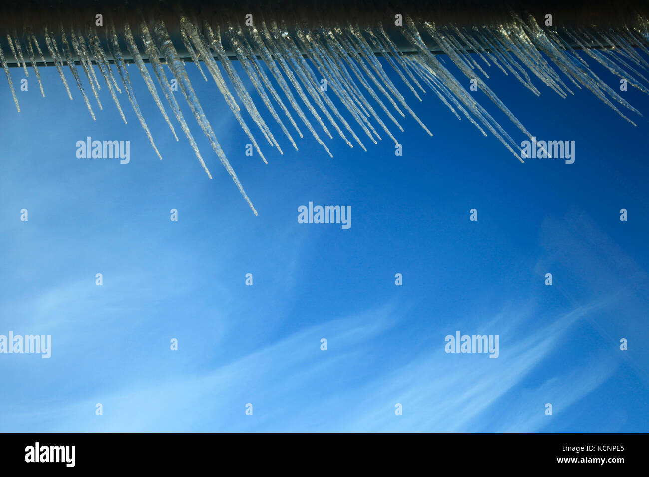 Ice icicle background postcard blue sky Stock Photo - Alamy