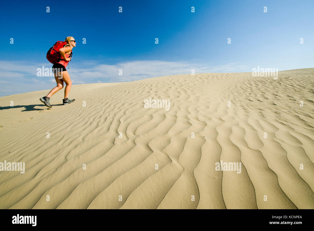 Girl hiking in the great saskatchewan sandhills hi-res stock ...