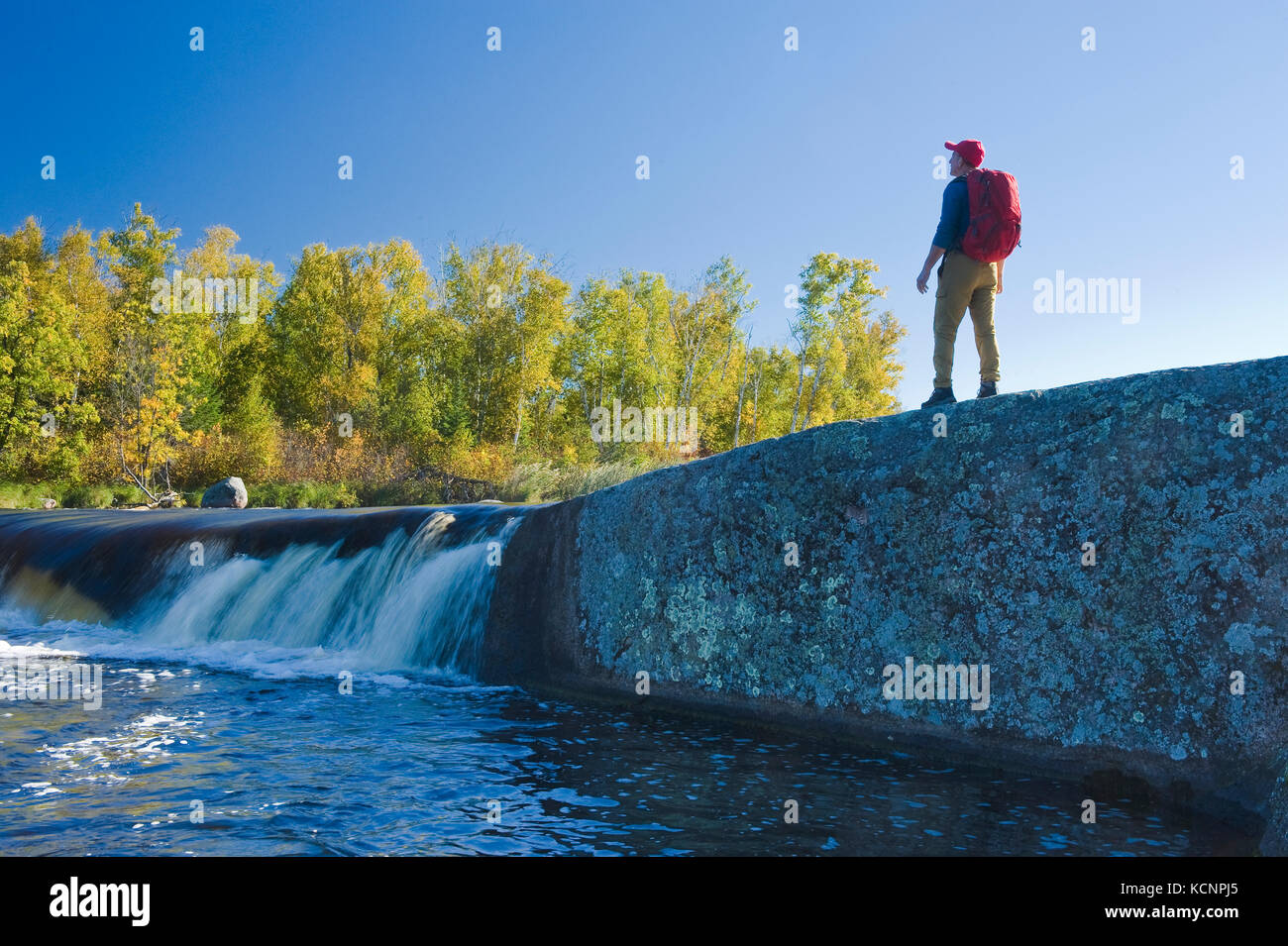 hiker, autumn, Rainbow Falls along the Whiteshell River, Whiteshell ...