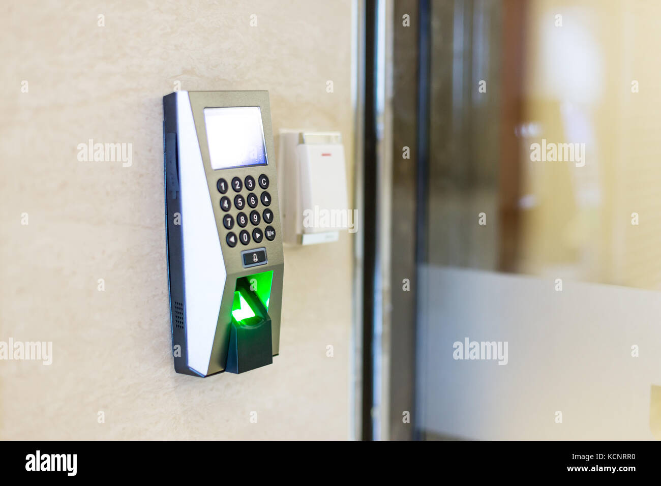 Finger on biometric fingerprint reader hi-res stock photography and ...