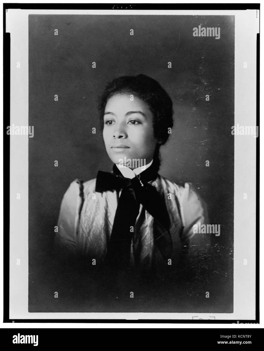 African American woman, head and shoulders portrait, facing left ...