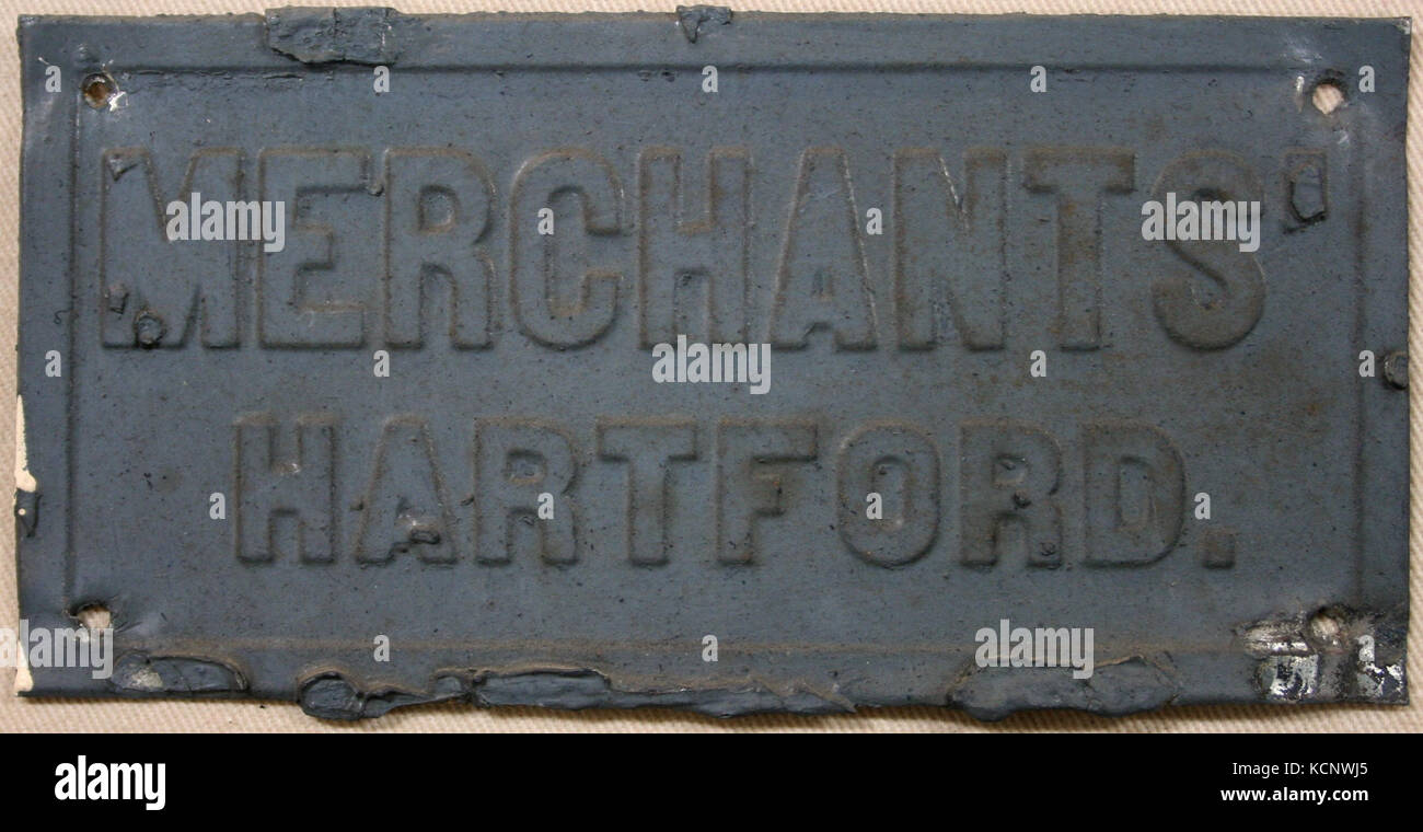 This image features a fire mark from the Merchants' Insurance Company ...