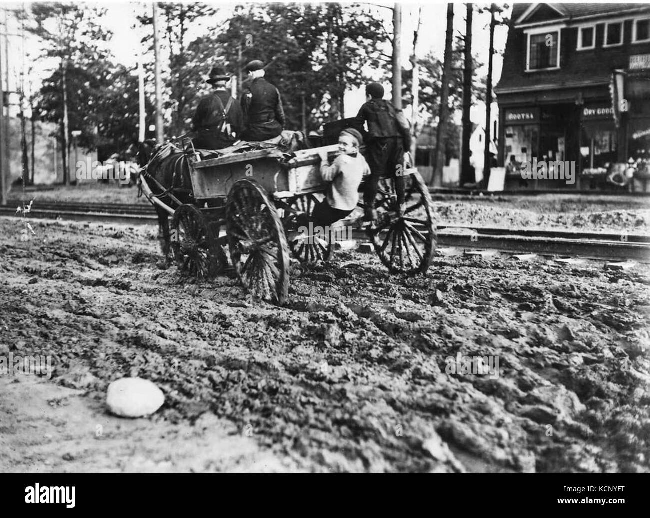Children hitch a ride on a carriage in Toronto Stock Photo - Alamy