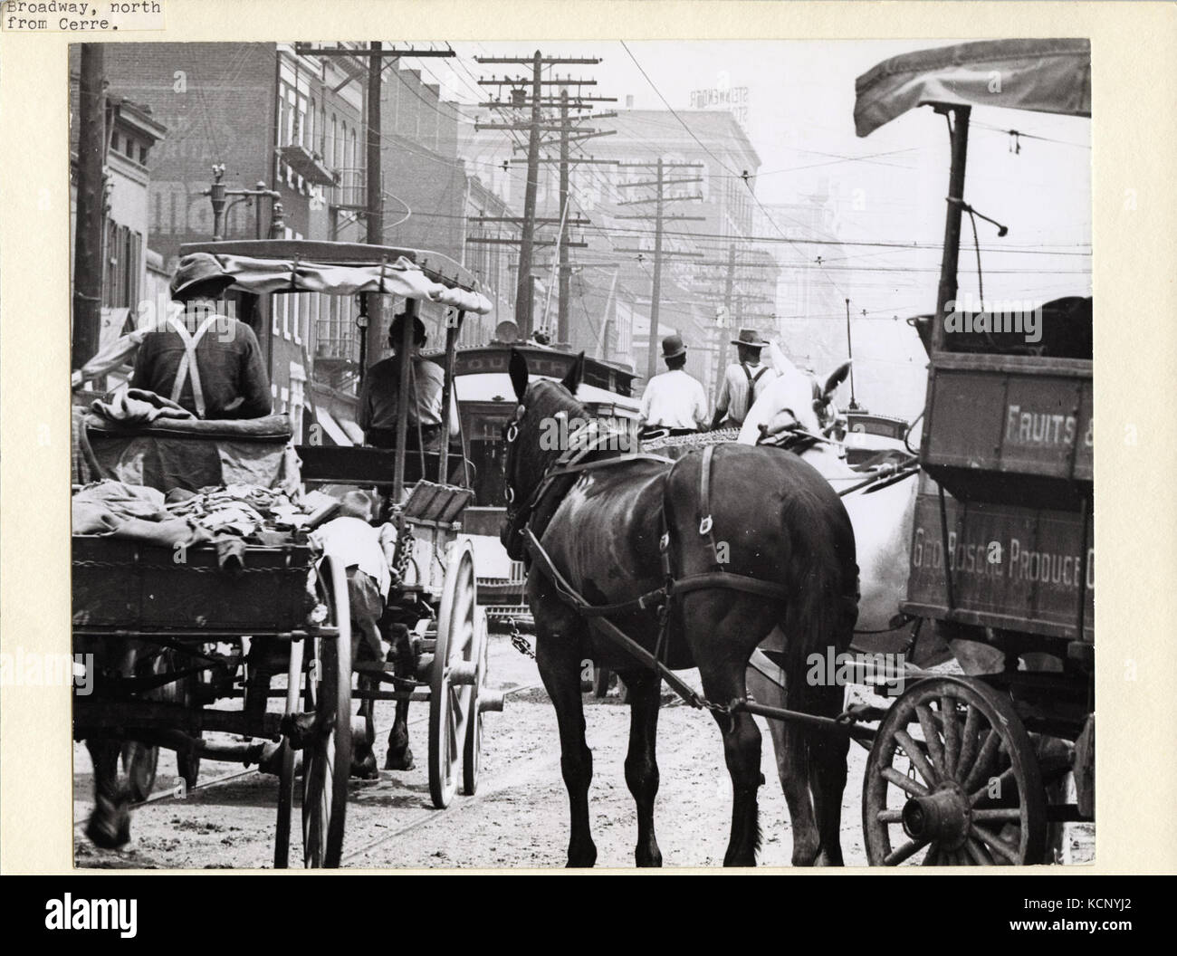 George Bosche Produce Company wagon pulling out into traffic on ...