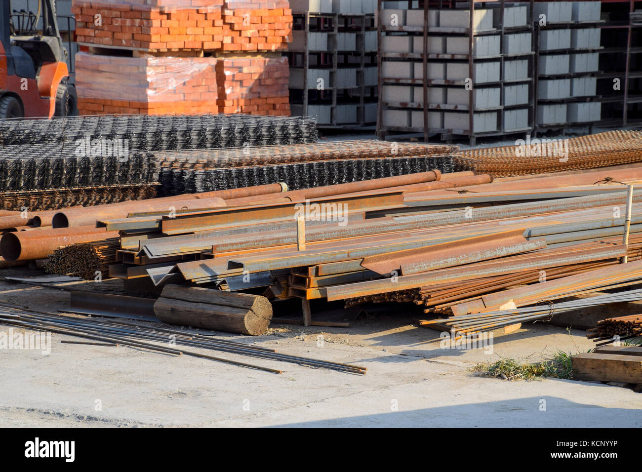 Building base with various materials for construction. Metal pipes ...