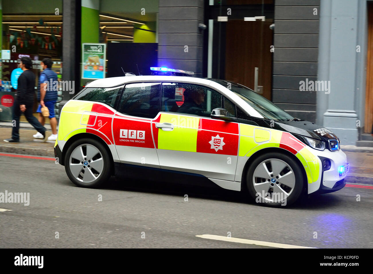London Fire Brigade response vehicle traveling on the streets with blue ...