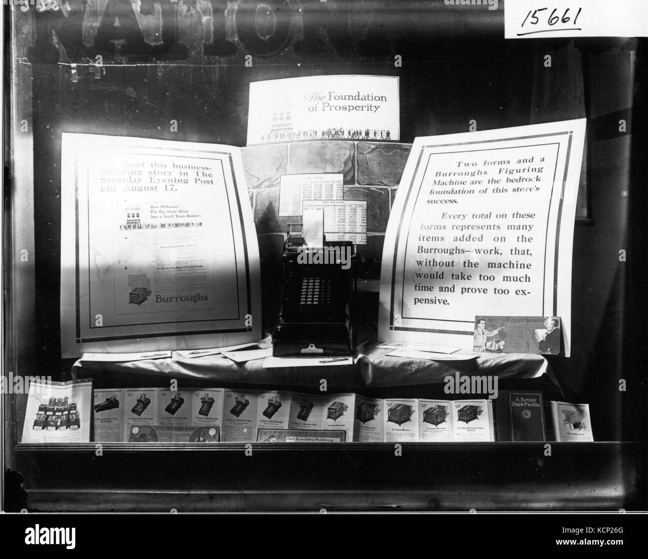 This photograph from 1916 shows a display of Burroughs adding machines ...