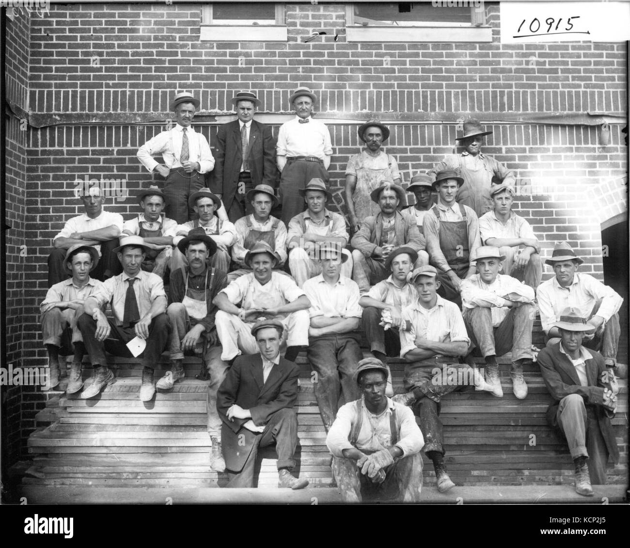 Construction crew on steps of campus building 1911 (3191463436 Stock ...