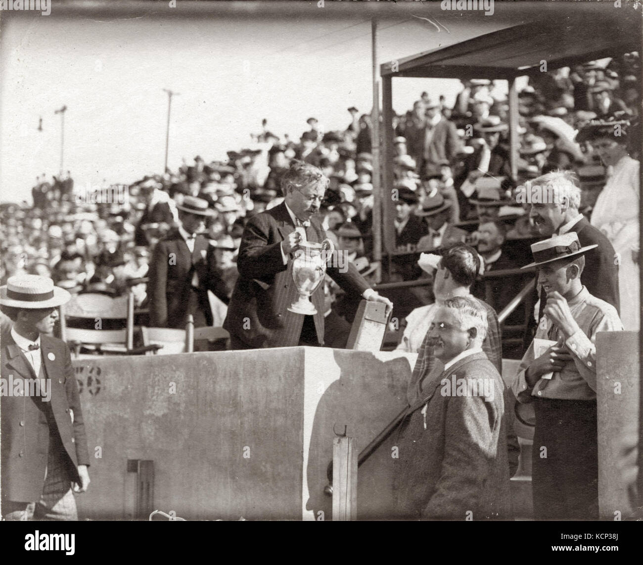 F.J.V. Skiff, Director of Exhibits, presenting a cup to Archie Hahn ...