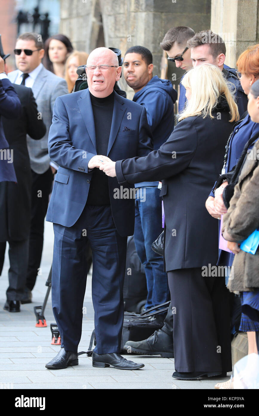 Comforted outside salford cathedral ahead funeral service hi-res stock ...