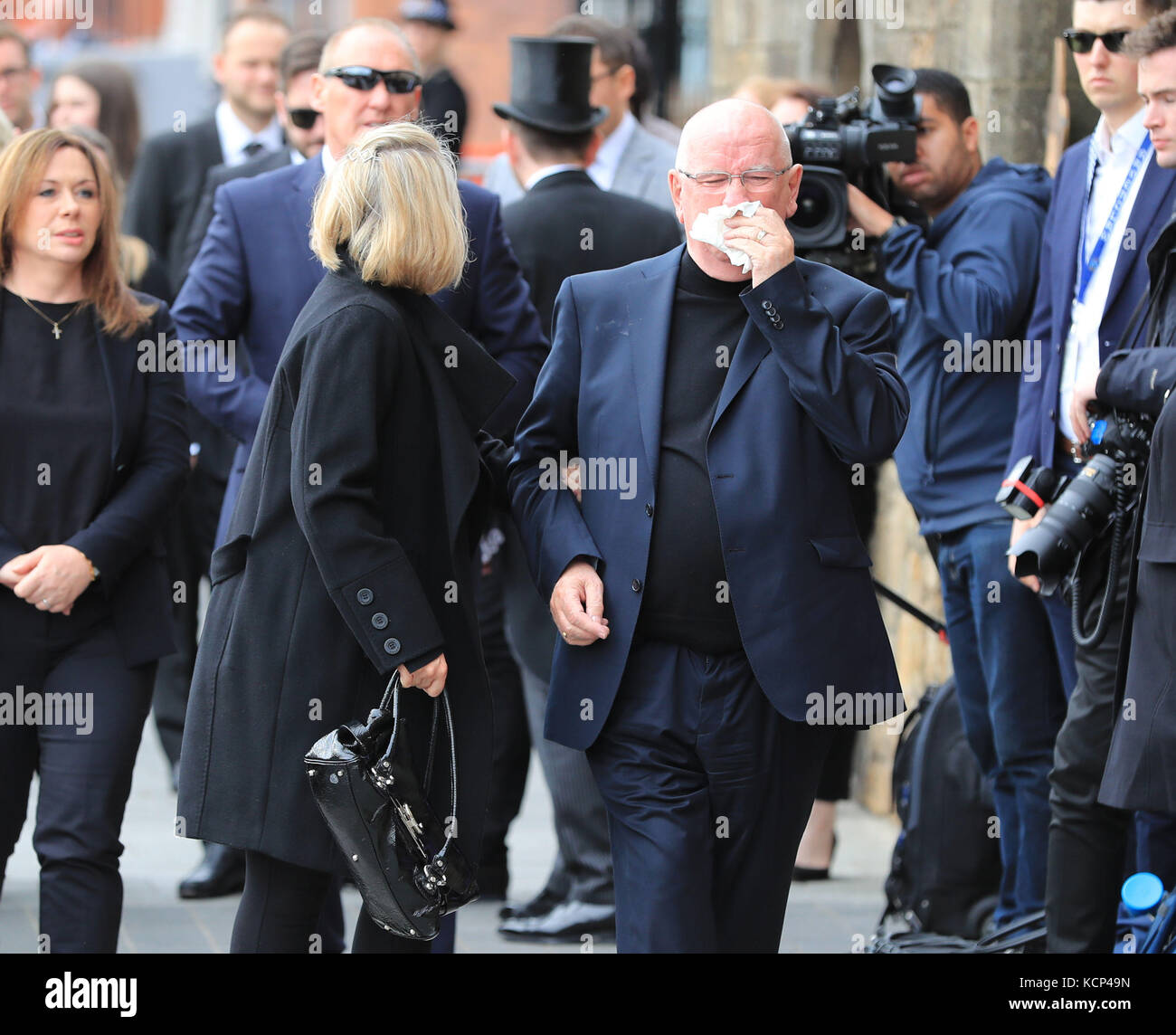 Comforted outside salford cathedral ahead funeral service hi-res stock ...