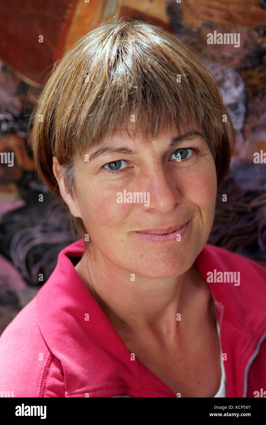 Artist Kim Atkinson in her studio with perspex sketches, paper sketches ...