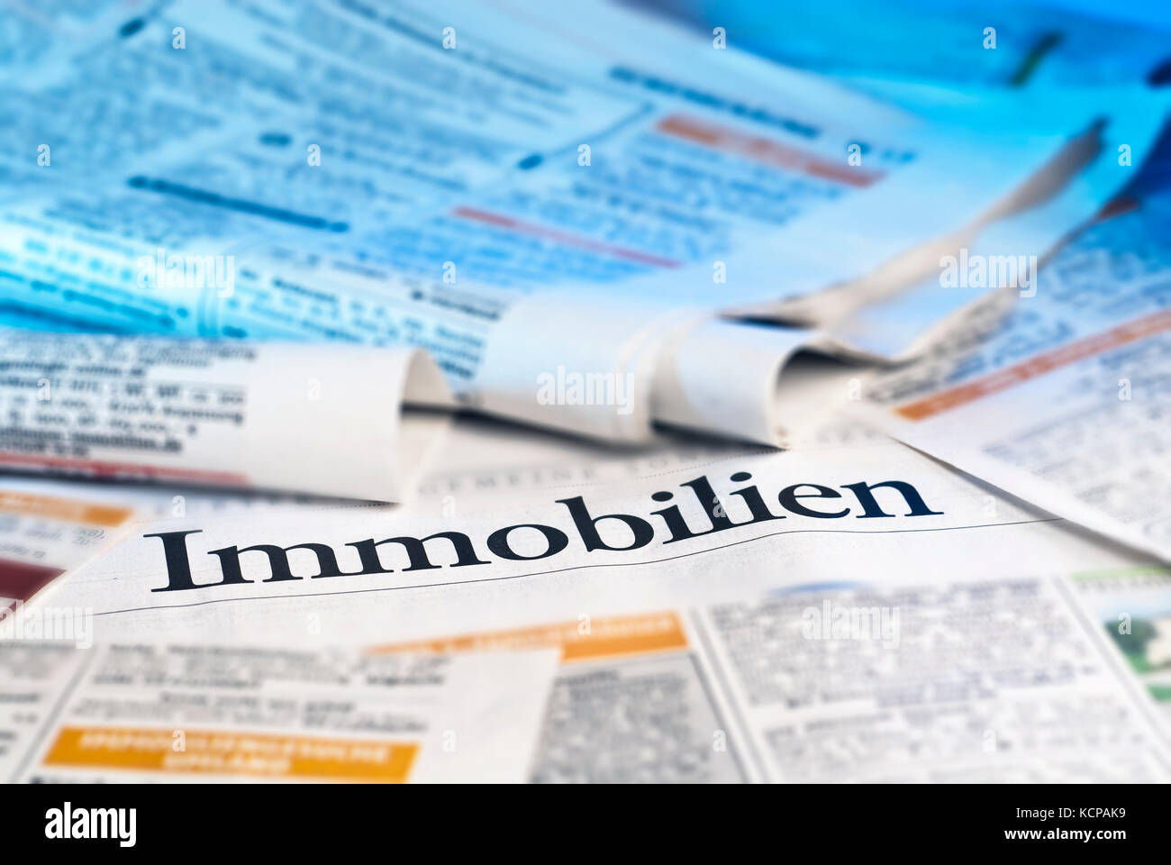 Real estate ads in the daily newspaper with the words "real estate ...