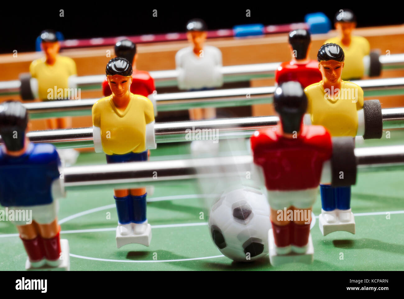 Play with the tabletop football Stock Photo - Alamy