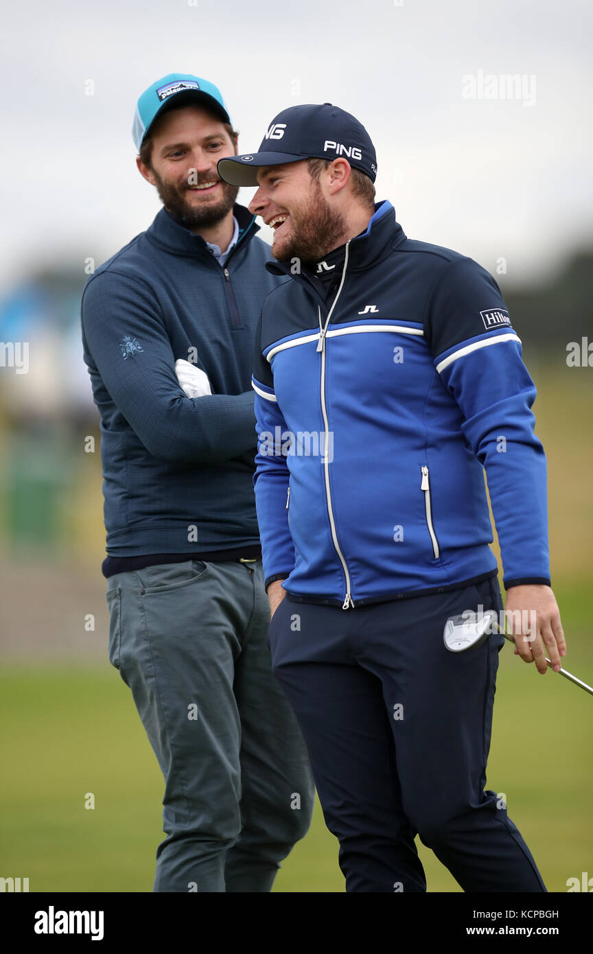 Jamie Dornan (left) and England's Tyrrell Hatton on the eighteenth ...