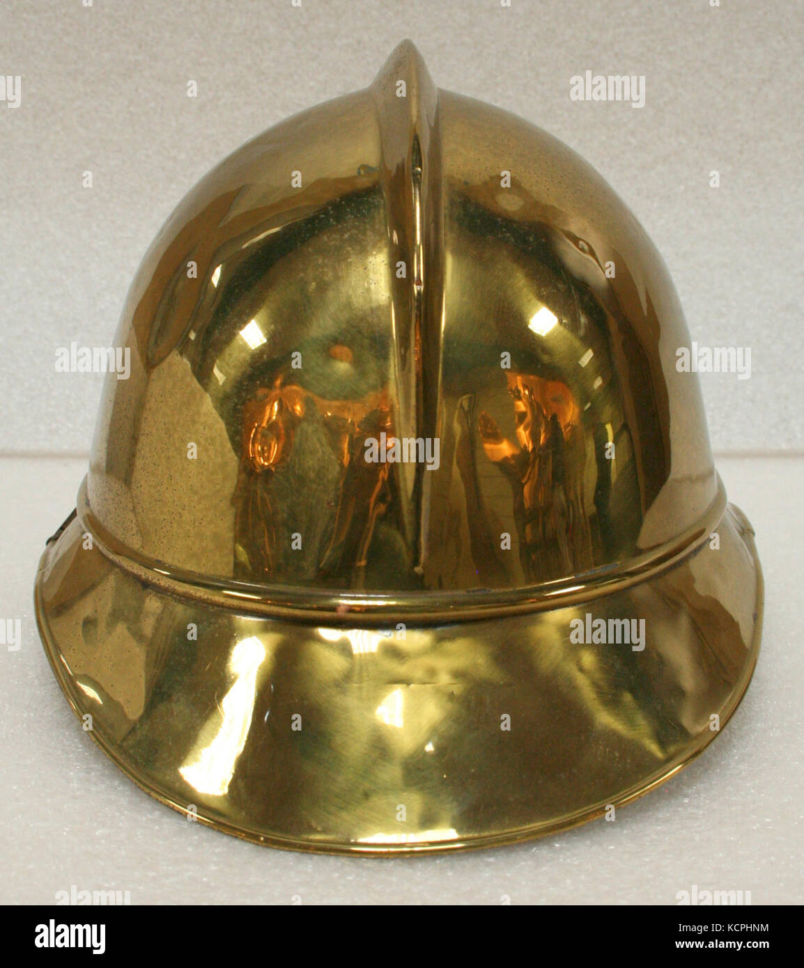 A German fireman's helmet from the early 20th century, representing the ...