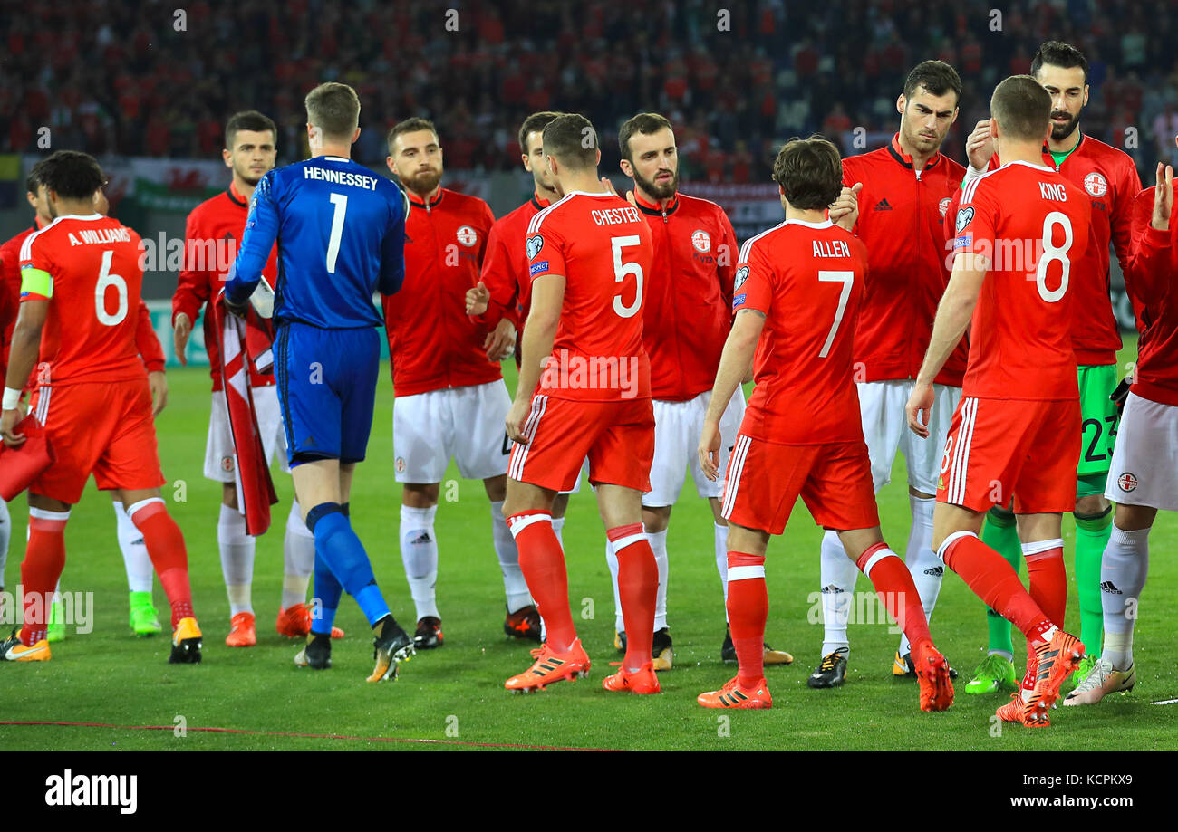Wales and Georgia players shake hands ahead of the 2018 FIFA World Cup ...