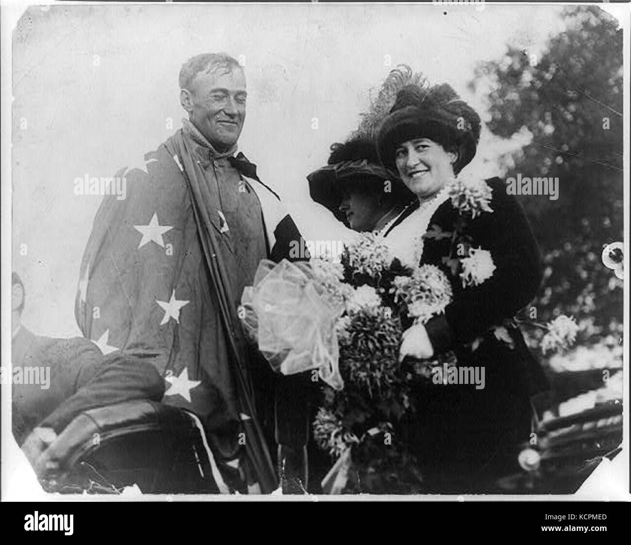Cal Rodgers draped with U.S. flag upon arrival in Pasadena Stock Photo ...
